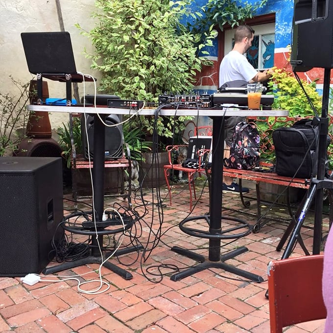 Even the music at Silk City gets special treatment—this outdoor DJ setup ensures your ears feast as thoroughly as your taste buds.
