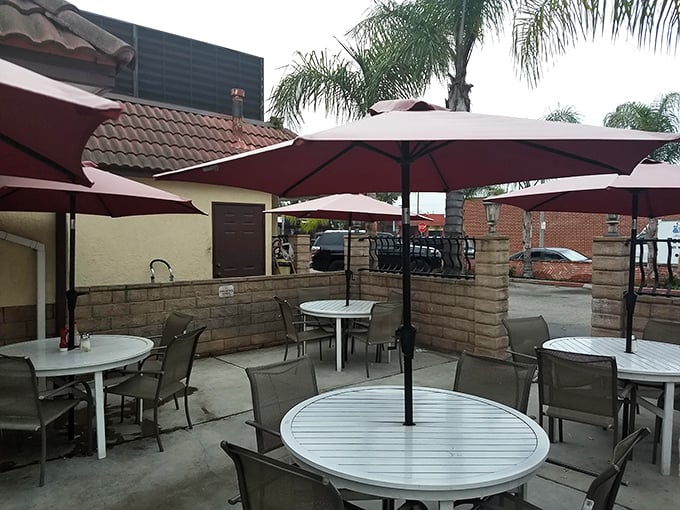 California dining as nature intended—outdoors under umbrellas. The patio offers fresh air with your fresh-cooked meal.