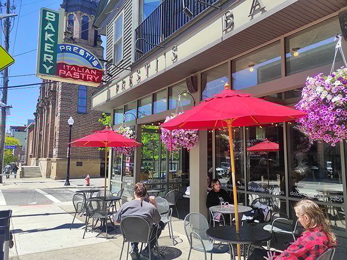 Those red umbrellas aren't just for shade – they're beacons signaling to Cleveland's Little Italy that life is sweeter on Presti's patio.