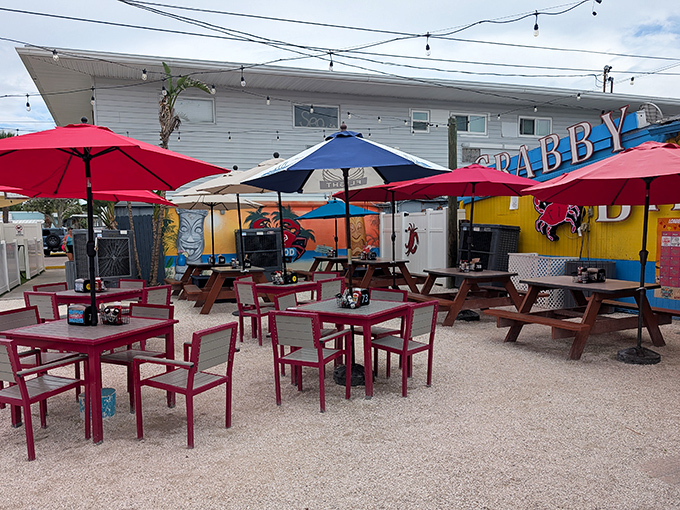 The outdoor patio – where umbrellas provide shade, sea breezes provide ambiance, and seafood provides the perfect excuse to linger.