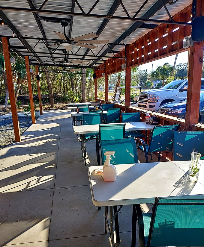 Covered outdoor seating where Gulf breezes enhance every bite. Florida dining as it should be—casual, comfortable, and connected to nature.
