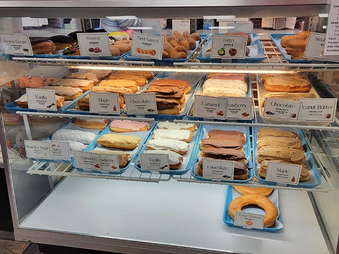The pastry case—where "I'll just have one" becomes the biggest lie you'll tell yourself all day.