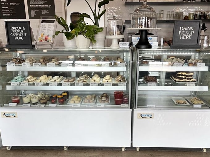 A display case that tests your willpower with each glance—these aren't just desserts, they're edible works of art.