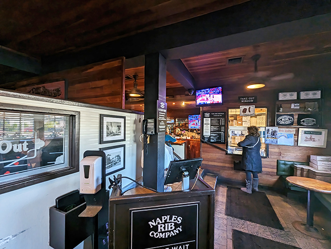 The entrance to meat paradise—where the aroma of slow-cooked perfection greets you before the staff does.