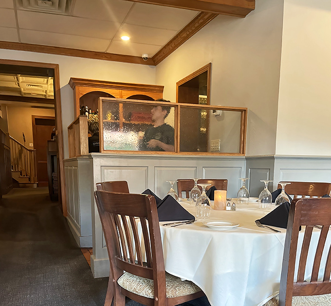 Intimate dining spaces separated by glass partitions offer the perfect setting for both first dates and fiftieth anniversaries.