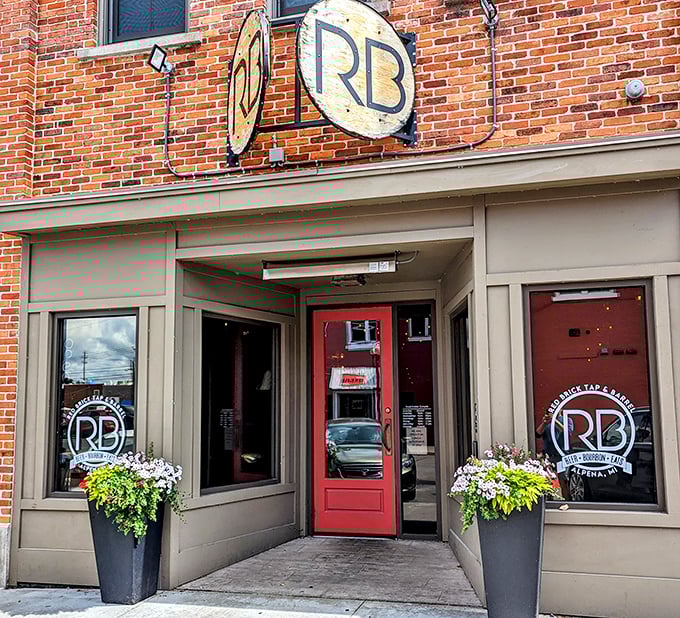 Red Brick Tap & Barrel's inviting entrance says "come for the craft beer, stay for the conversations" – the kind of place where strangers become friends over shared appetizers.