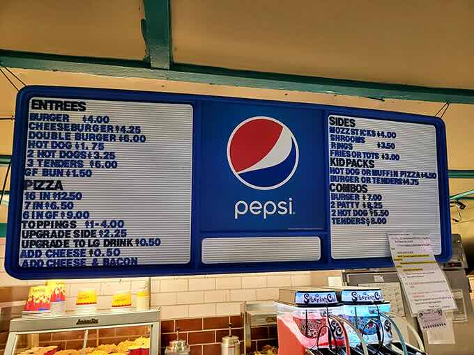 The menu board—a monument to classic American movie fare where calories don't count if consumed during coming attractions.
