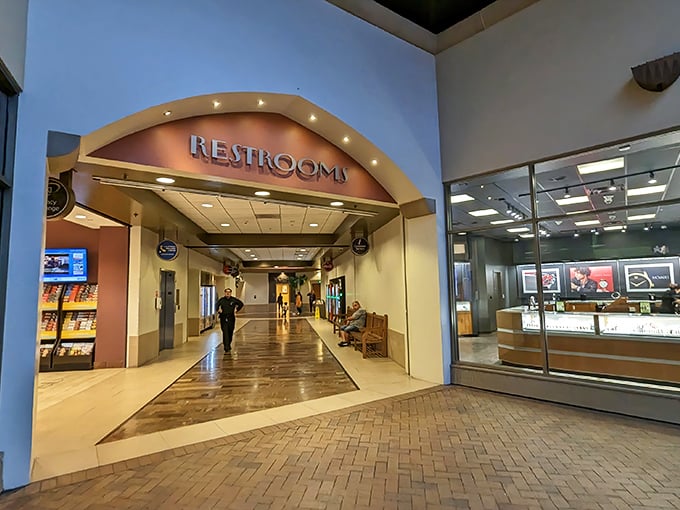 The restroom entrance looks surprisingly grand, as if to say, "Even necessary breaks deserve architectural consideration at Citadel Outlets."