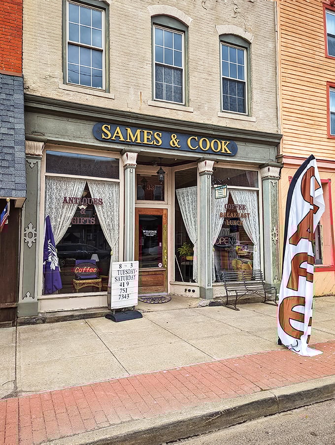 Sames & Cook's lace curtains and welcoming storefront whisper of a gentler shopping era when browsing was an afternoon's entertainment, not a quick click.