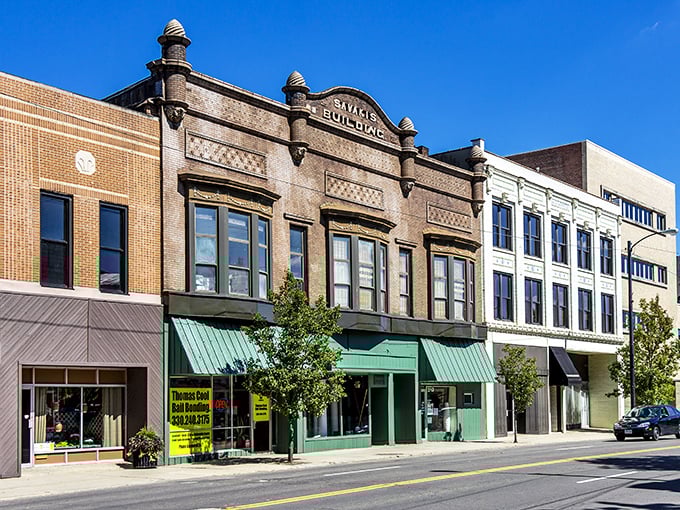 The Savakis Building's ornate façade showcases the craftsmanship of an era when even commercial buildings dressed to impress.