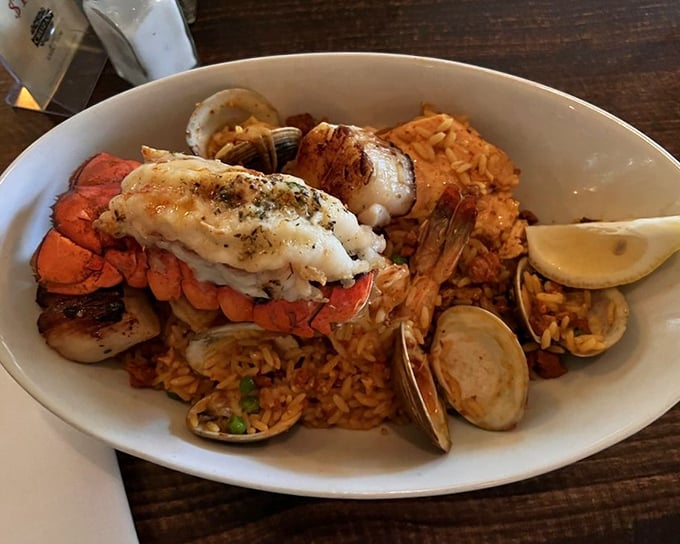 A seafood rice dish where every grain seems blessed by the sea gods. Clams and lobster playing hide-and-seek among the perfectly cooked rice.