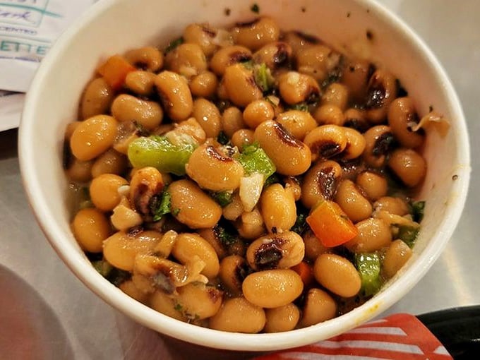 Black-eyed peas with personality, bringing luck and flavor to your hot chicken adventure.