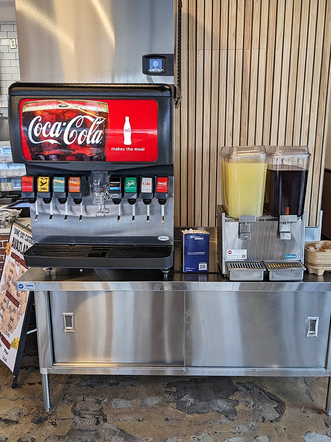 The self-serve beverage station stands ready with sweet tea and sodas—because proper fried chicken demands proper hydration.