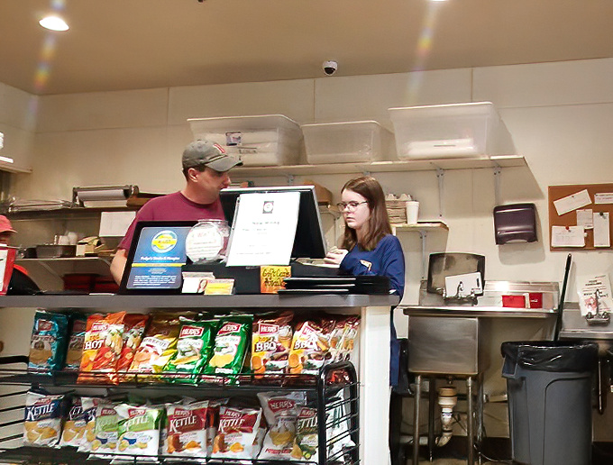 Where the magic happens – friendly faces taking orders with the efficiency of people who know they're providing essential services to humanity.