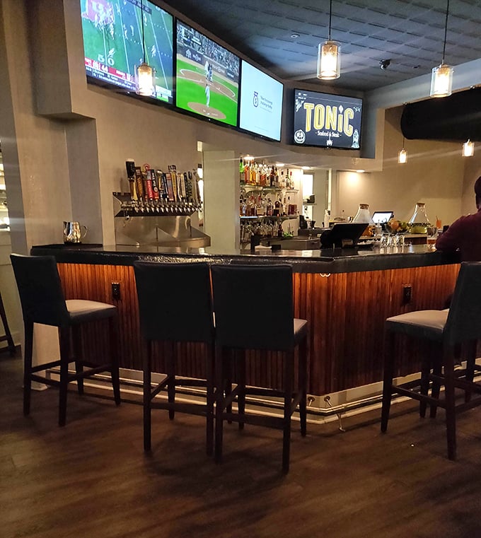 A bar that balances sports-watching accessibility with craft cocktail credibility – the Switzerland of drinking establishments.