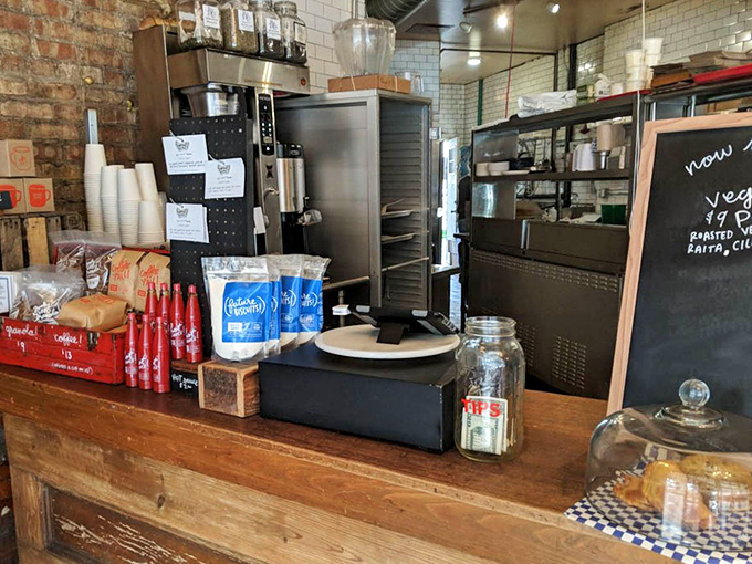 Behind the counter, where the magic happens—like Willy Wonka's factory, but with significantly less risk of turning into a blueberry.