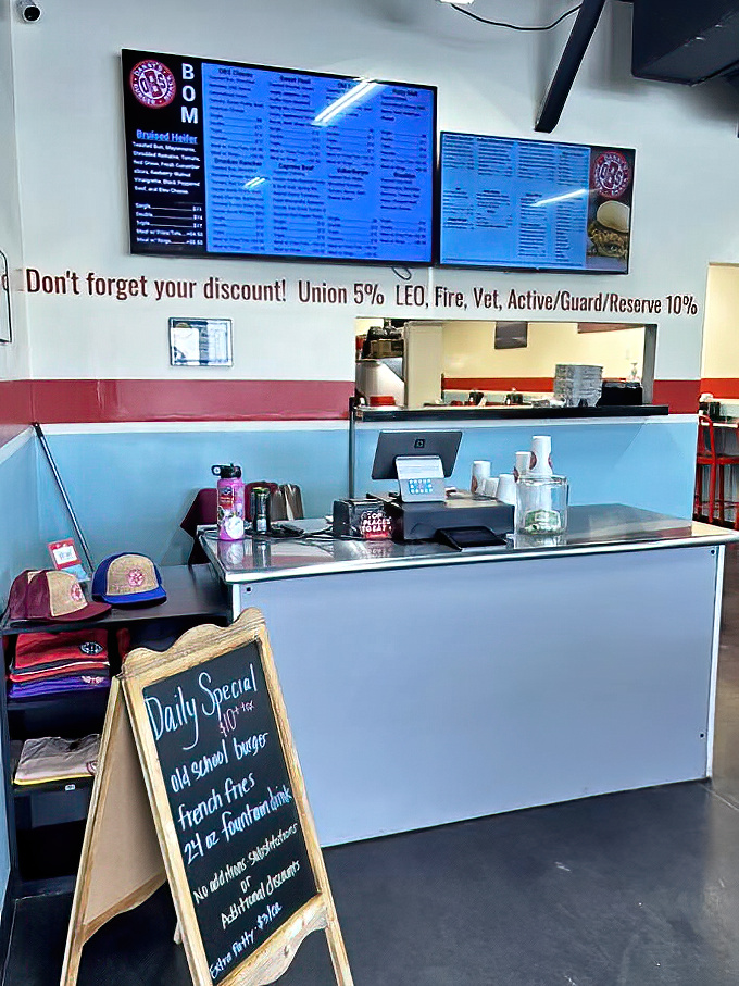 The ordering counter—where dreams are placed and hunger pangs go to die. Notice the chalkboard specials calling your name.