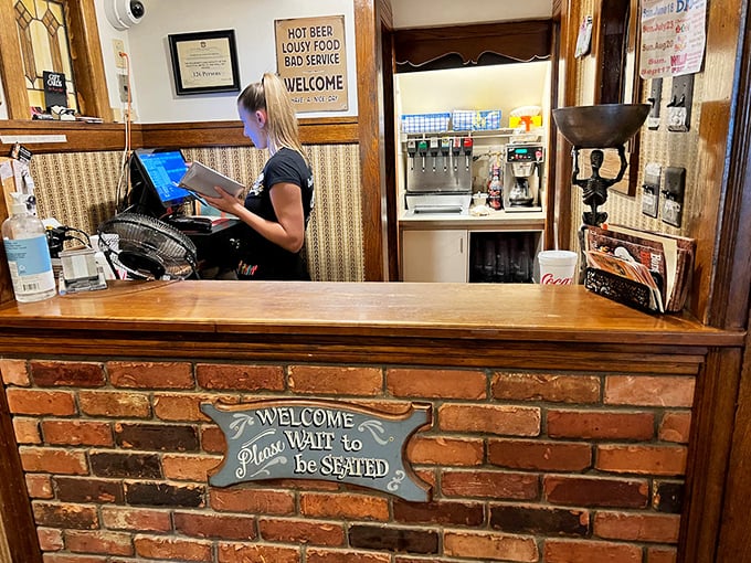 "Please Wait to be Seated" isn't just a sign—it's a promise that good things come to those who wait for barbecue.
