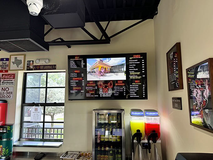 Digital menus make ordering efficient, but it's the aroma wafting from behind that counter that really makes decisions for you. Technology meets tradition in barbecue harmony.