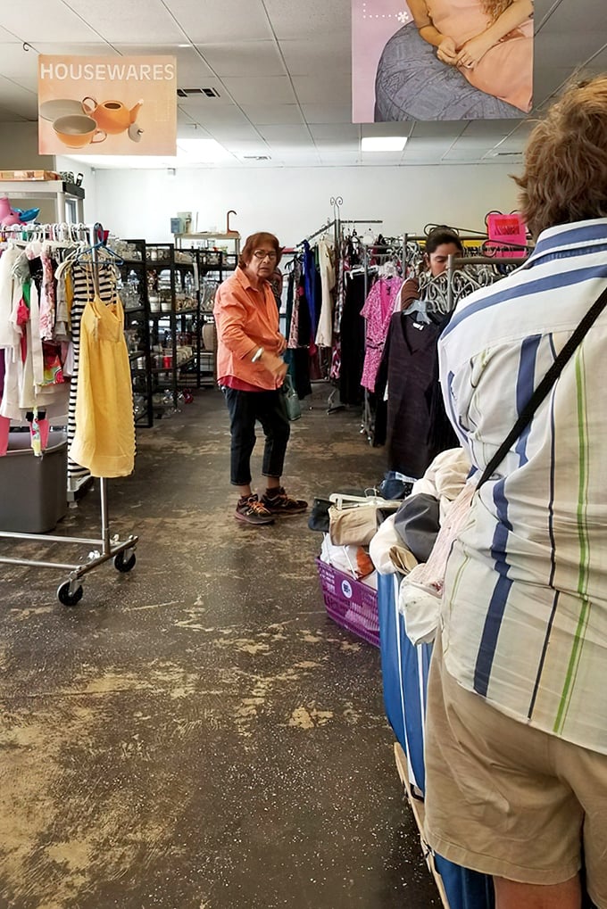 Fellow treasure hunters navigating the aisles with the focus of seasoned archaeological expedition members.