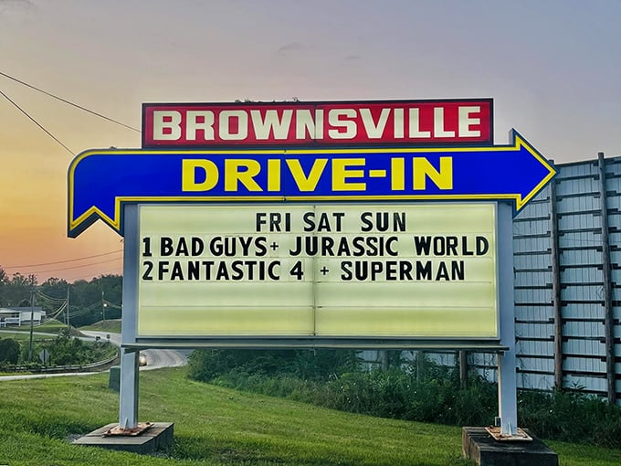 The marquee at dusk—announcing double features with the same excitement as when drive-ins were America's premier date night destination.
