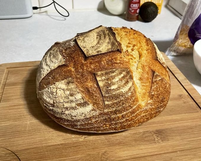 This sourdough boule isn't just bread—it's a crusty, golden testament to patience and craftsmanship. Worthy of center-table status at any meal.