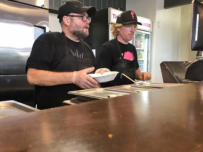 Behind the counter, the chicken wizards work their magic – transforming ordinary poultry into extraordinary experiences one order at a time.