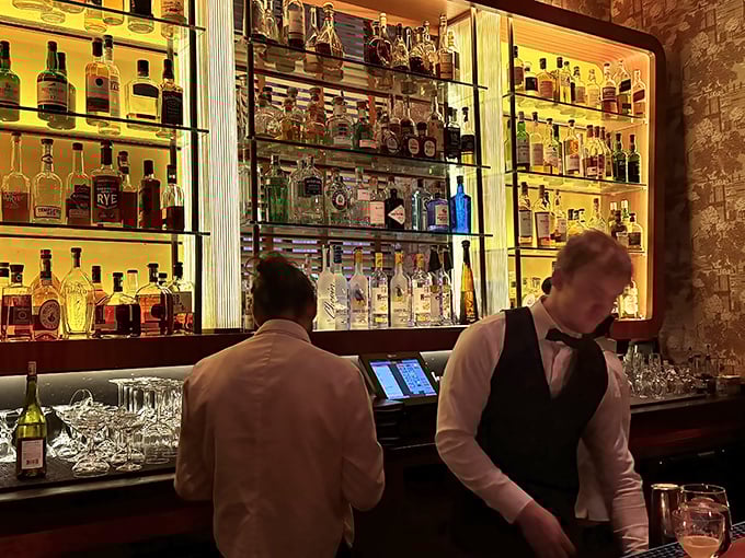 The staff moves with the choreographed precision of Broadway dancers, turning dinner service into a seamless performance.