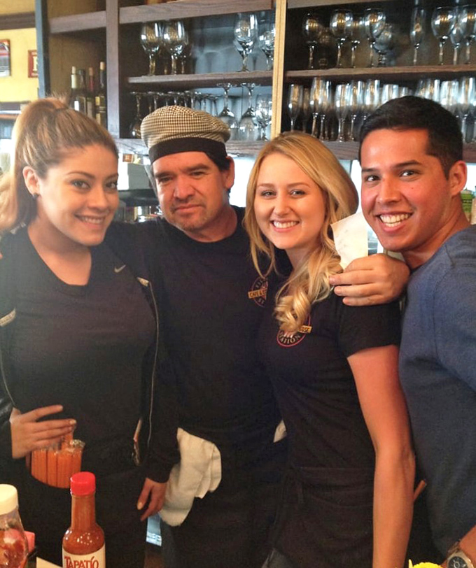 The staff's genuine smiles tell you everything—this is a place where food is served with equal parts skill and heart.