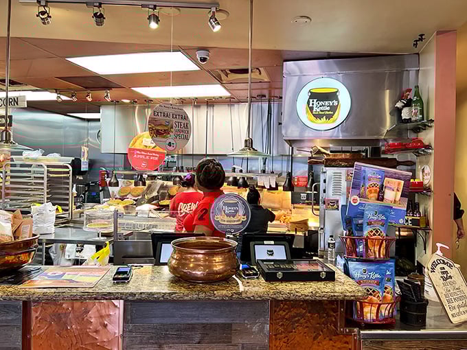 The open kitchen concept lets you witness the choreography of chicken preparation – these folks know exactly what they're doing.