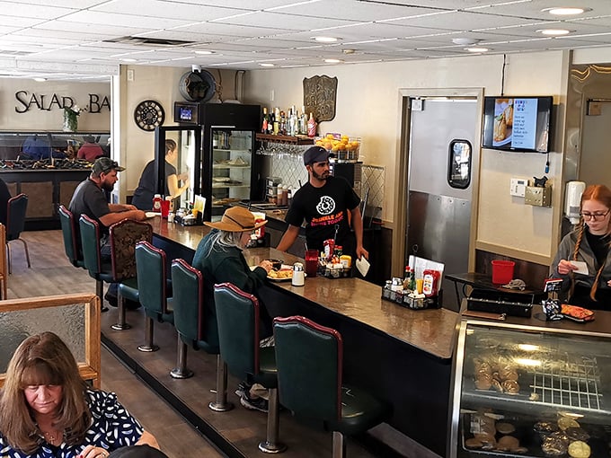 Where the magic happens—friendly staff keeping coffee cups filled and breakfast coming hot off the grill without missing a beat.