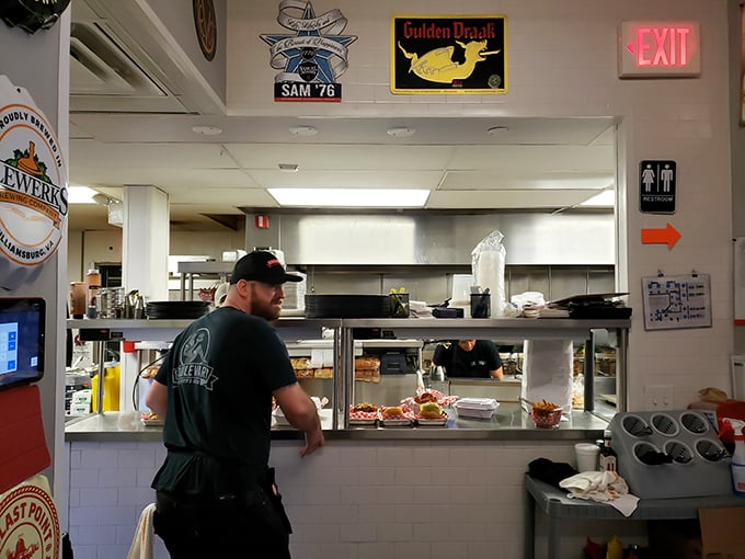 Where burger magic happens—the open kitchen lets you witness the choreography of grill masters at work.