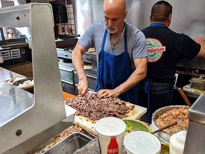 Hands that know exactly what they're doing. Decades of muscle memory transform simple ingredients into legendary meals.