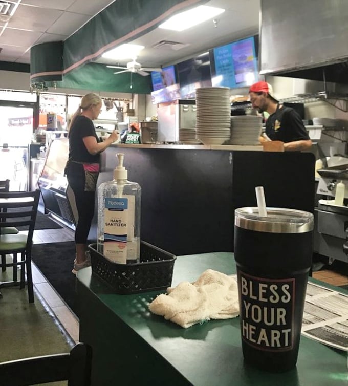 That "Bless Your Heart" cup isn't just holding a beverage; it's channeling the spirit of Southern hospitality in this decidedly Northern-style deli.