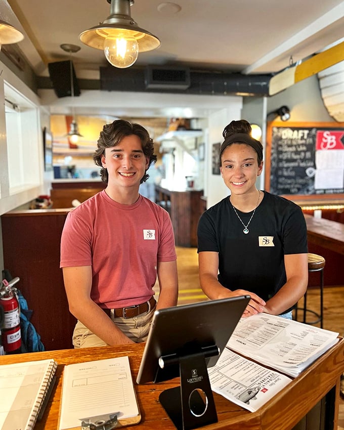 The friendly faces behind the Striper Bites magic—where genuine Delaware hospitality comes with every plate that leaves the kitchen.