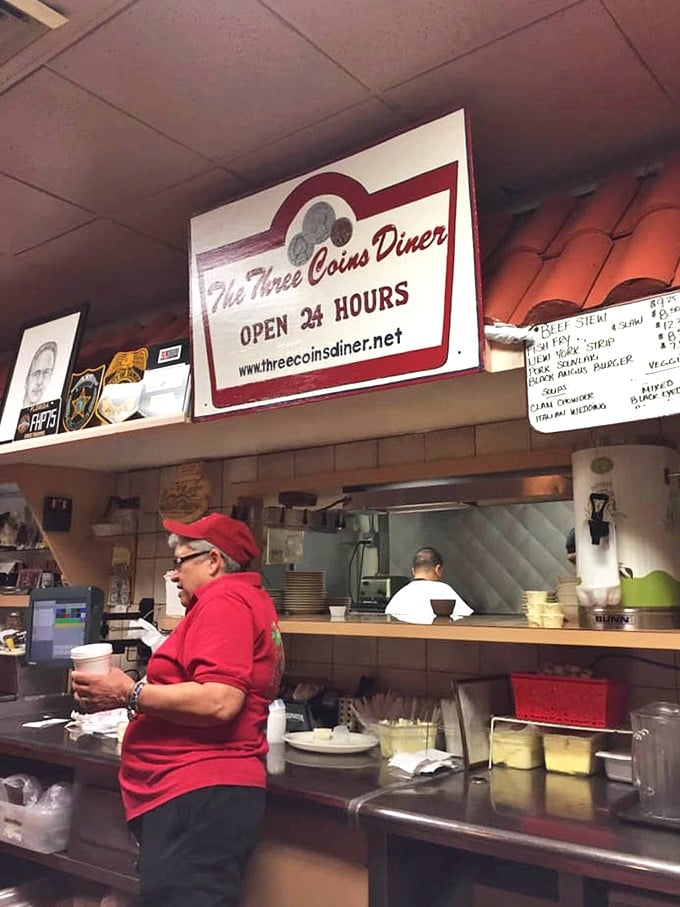 The sign proudly announces their website—proof that even timeless institutions recognize we live in a world of online reviews.