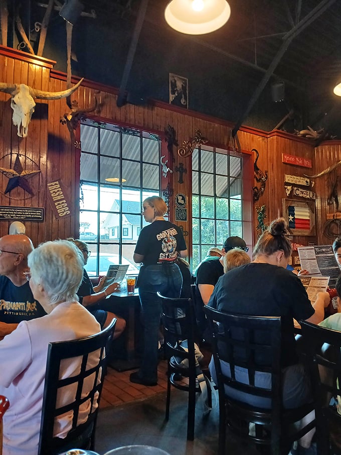 The staff moves with practiced efficiency, taking orders and delivering plates with the kind of authentic hospitality that can't be trained—only lived.