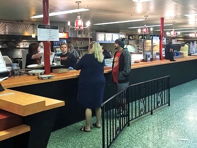 Movie night transactions happening the old-fashioned way—face-to-face conversations instead of tapping an app for tickets.