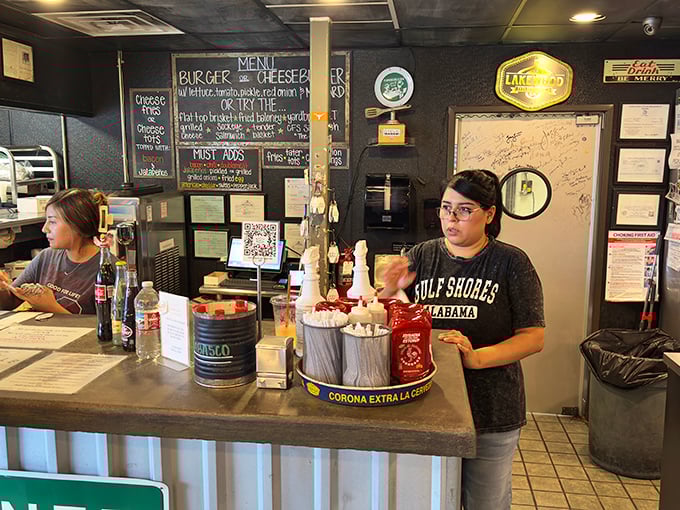Behind the counter, where burger magic happens, staff members orchestrate a delicious symphony with the precision of seasoned conductors.