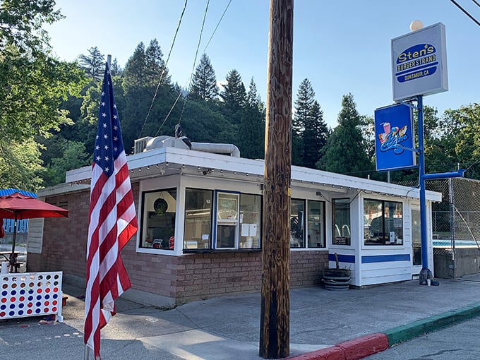 Sten's Burger Stand proves that sometimes the most memorable meals come from places where the American flag flies higher than the corporate logo.