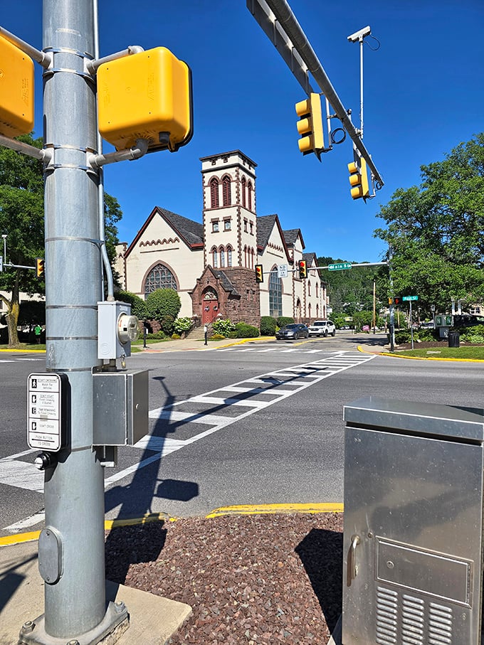 This stately church stands sentinel at a Wellsboro intersection, its impressive tower reaching skyward like an architectural exclamation point on a perfect blue-sky day.