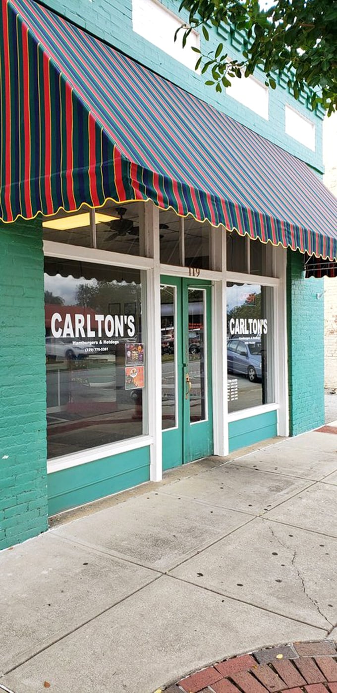 That colorful awning isn't just keeping the sun out—it's signaling to hungry travelers: "Salvation from mediocre fast food lies within."