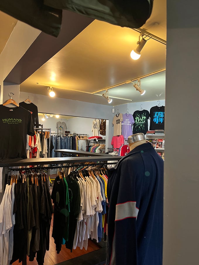 The t-shirt section reads like a concert tour of decades past, each graphic a time machine to someone else's perfect night out.