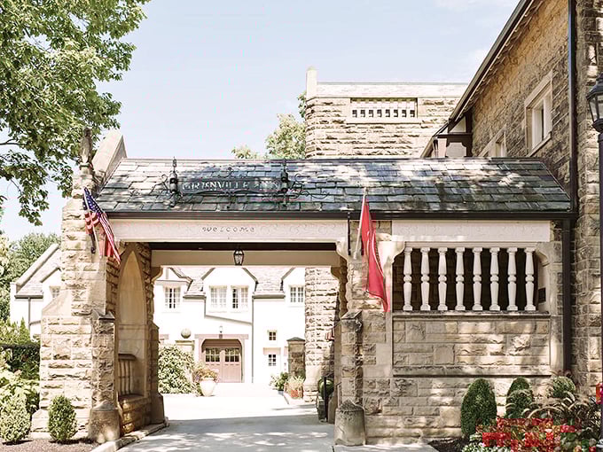 The Granville Inn's stone archway doesn't just welcome guests—it transports them to a world where historic elegance meets Midwestern hospitality.
