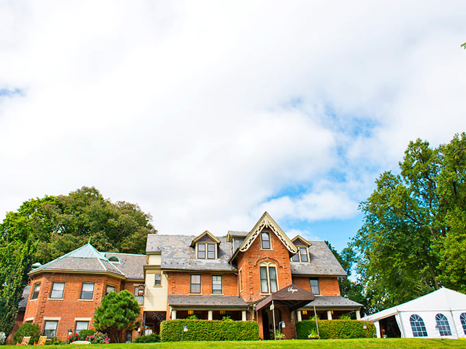 The Sayre Mansion combines Victorian grandeur with Pennsylvania practicality, its brick facade and sweeping porch inviting visitors to step back into a more genteel era.