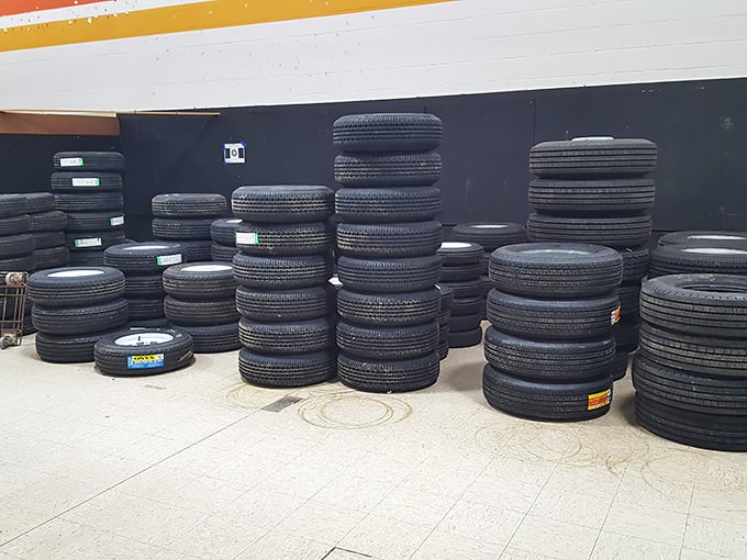 Tire kingdom! Someone's perfect set of wheels is waiting in these stacks. Who knew rubber could look so full of possibility?