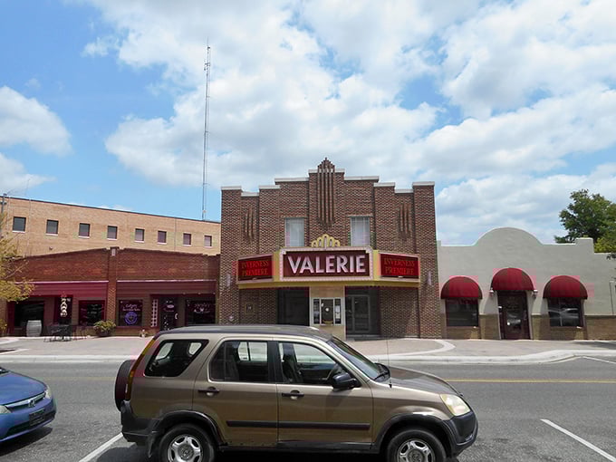 The Valerie Theatre's vintage marquee promises entertainment with a side of nostalgia – no smartphone required for this authentic experience.