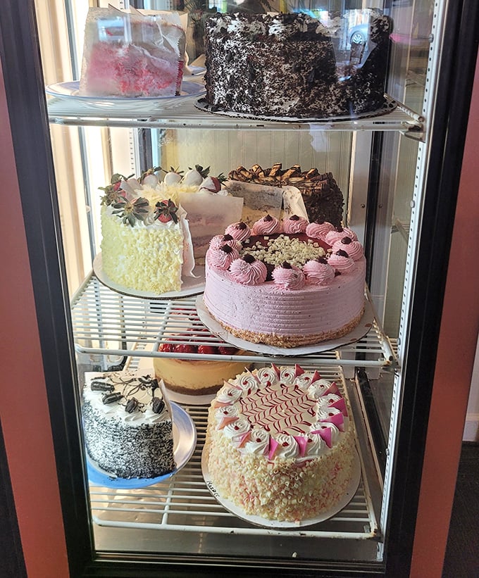 A dessert case that turns grown adults into wide-eyed children. Each cake is a masterpiece that belongs in both a gallery and your stomach.