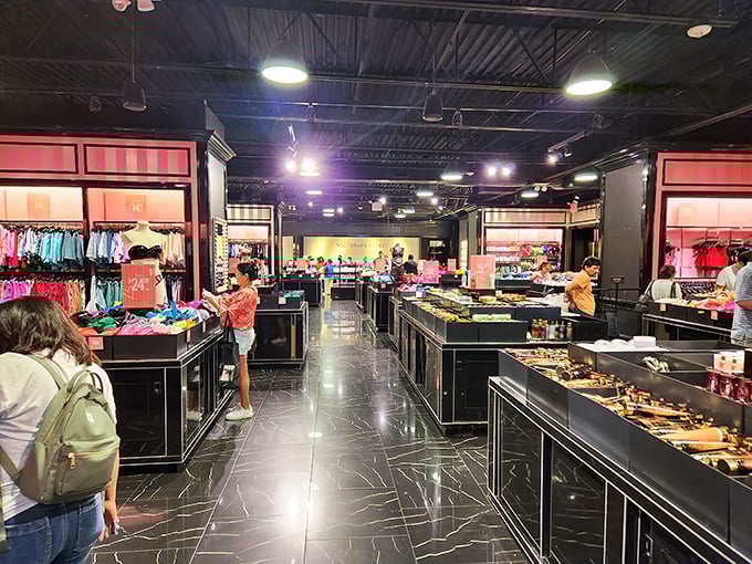 Victoria's Secret in all its pink-hued glory – where shopping bags are badges of honor and everyone pretends they're just buying loungewear.