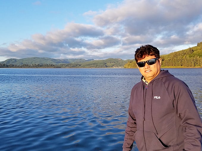 The bay's tranquil waters provide the perfect backdrop for contemplation—or for that profile picture that says "Yes, I commune with nature."